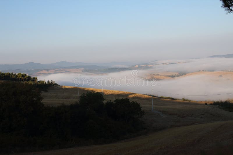 The Contrast between Fog, Earth and Sky Stock Photo - Image of earth ...