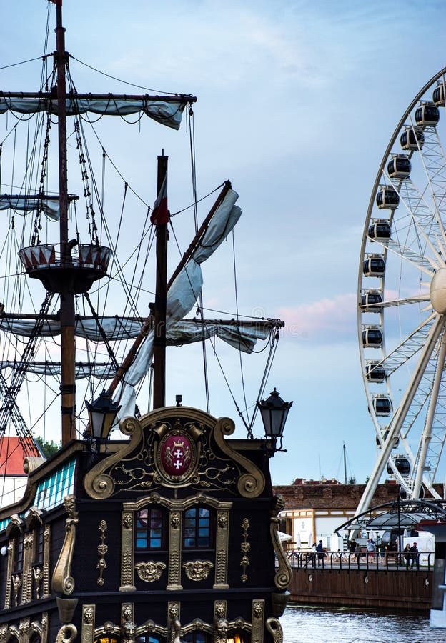 Old Sailing Ship and a Modern Ferris Wheel Stock Image - Image of ...
