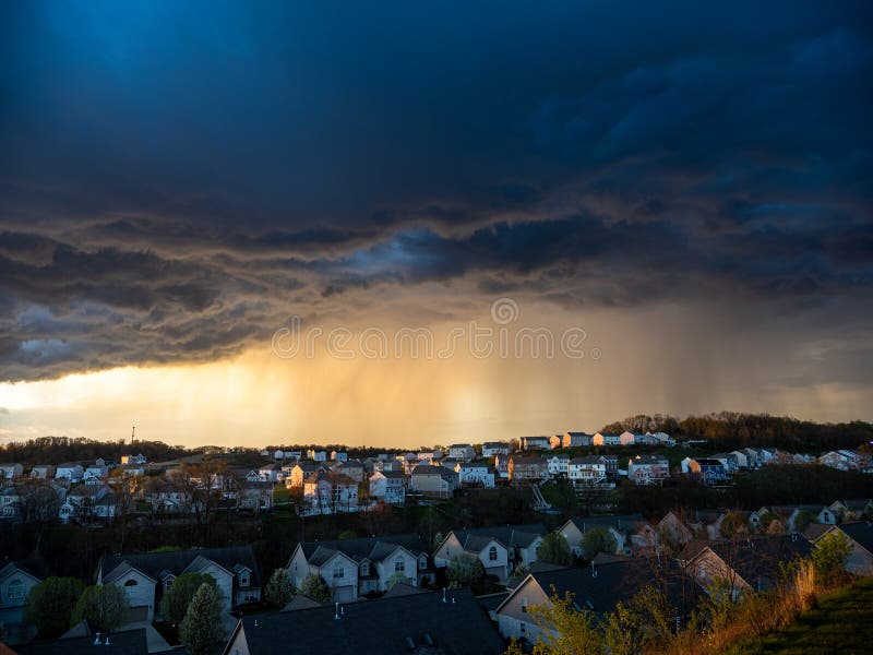 Dramatic Clouds and Bad Weather Approaching Over US Neighborhood with ...