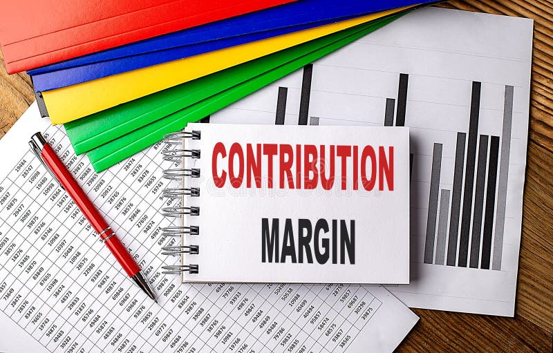 CONTRIBUTION MARGIN Text on Notebook with Folder on Chart Stock Photo ...