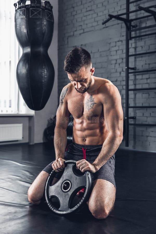 The Athlete Trains Hard in the Gym. Fitness and Healthy Life Concept ...