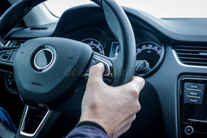 Control Buttons on Steering Wheel Stock Image - Image of hands, closeup ...