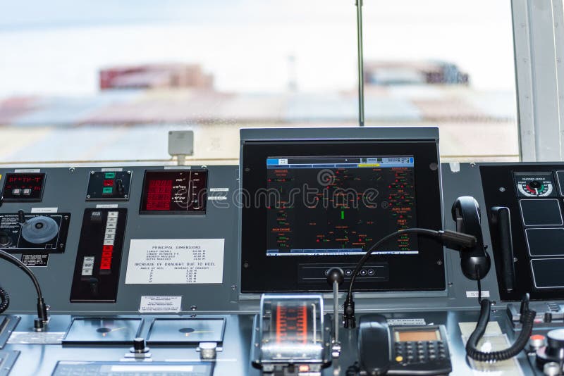 A Control Console Filled with Navigation Instruments Aboard a Large ...
