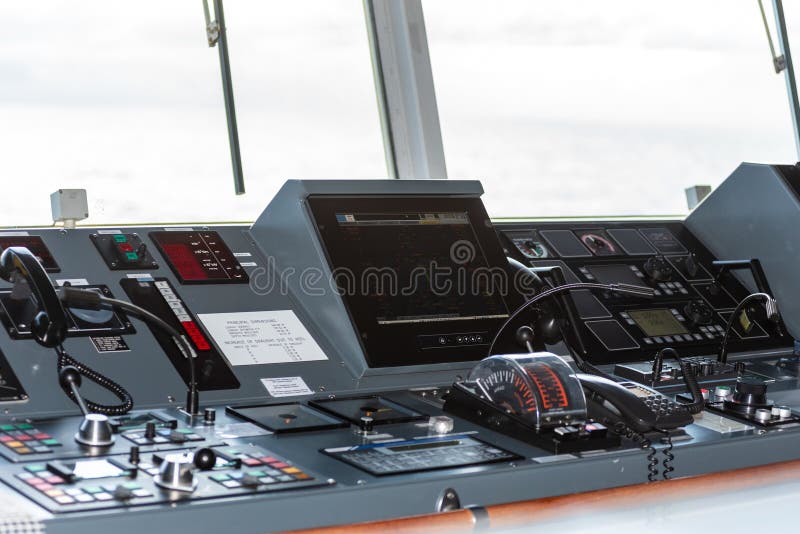 A Control Console Filled with Navigation Instruments Aboard a Large ...