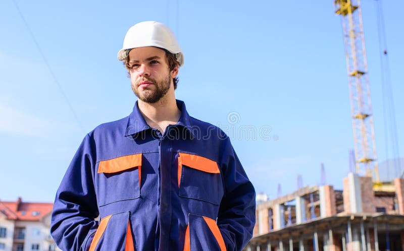 Control Construction Process. Builder in Working Clothes and Helmet ...