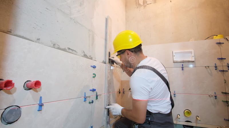 Installation of Ceramic Tile on Floor in Flat in Building Under ...