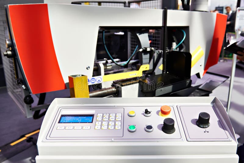 The Automatic Band Saw Machine Cutting the Group of Square Tubes with ...