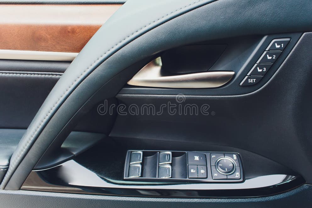 Control Panel in the Car Door. Car Door Handle with Adjustment Knobs ...