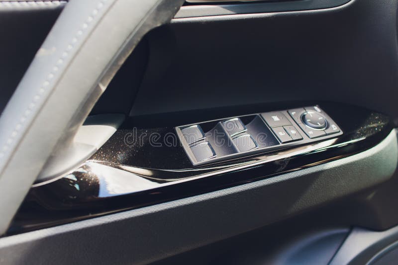 Control Panel in the Car Door. Car Door Handle with Adjustment Knobs ...