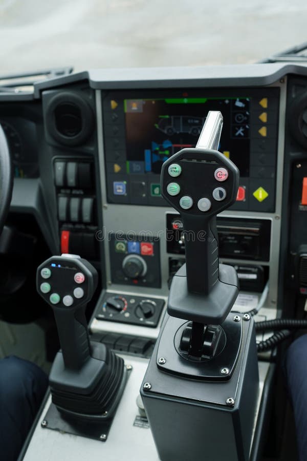 Control Panel with Joystick Handles for Operating Heavy Machinery in a ...