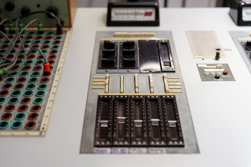 Control Panel with Knobs and Switches in a Vintage Electronic Equipment ...