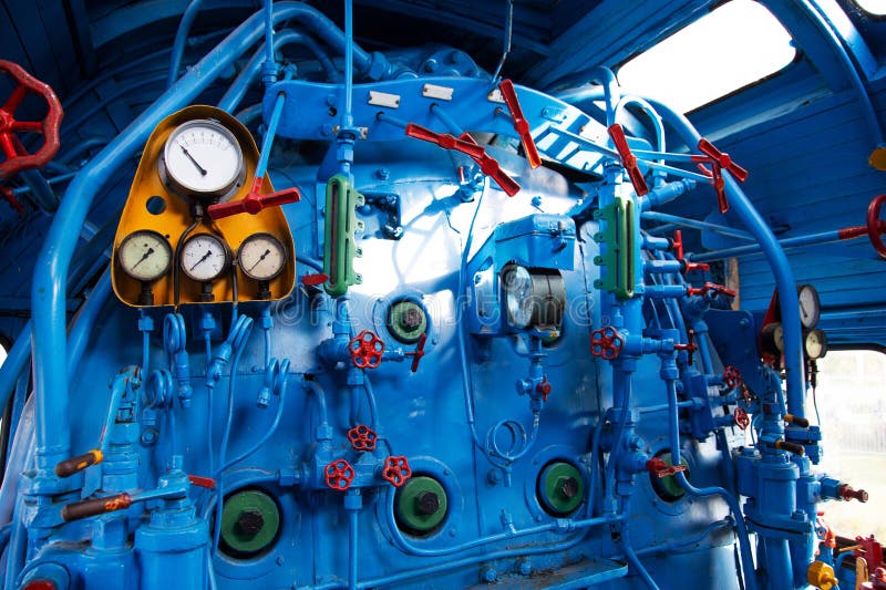 Control Panel of an Old Steam Locomotive Inside with Gauges and ...