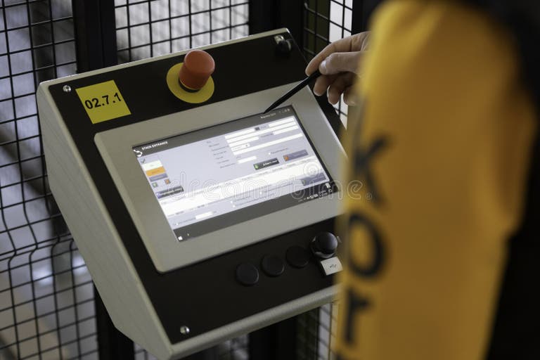 Control Panel Operation for Machinery in an Industrial Setting during ...