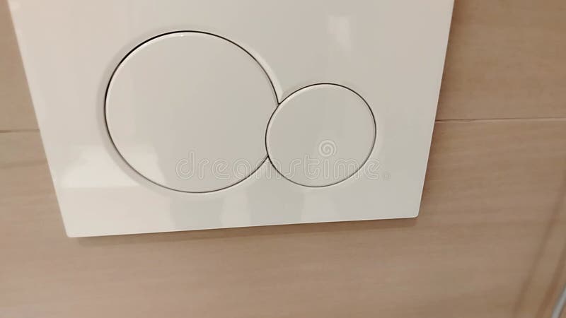 Control Panel, Two Round Toilet Flush Buttons on the Wall Stock Video ...