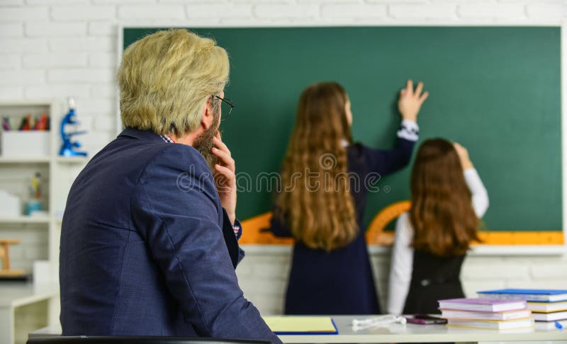 Watching Them. Teacher and Kids Classroom. Discussion Group of Children ...