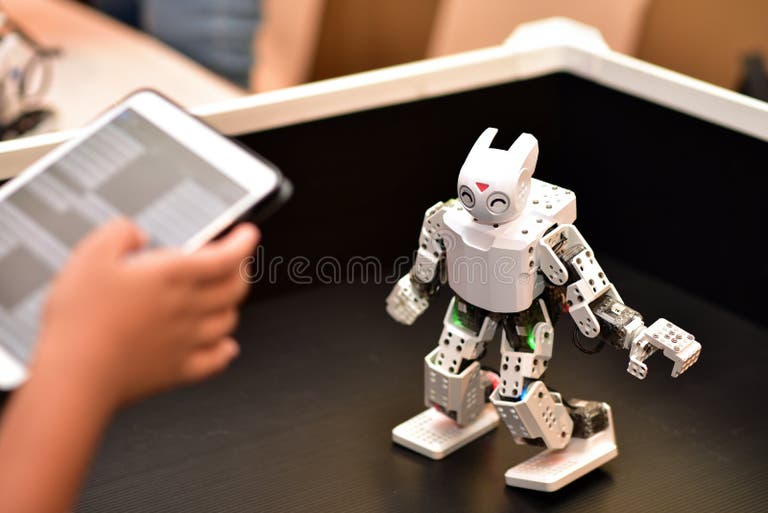 Control a Robot.Move a Robot Stock Image - Image of caucasian ...
