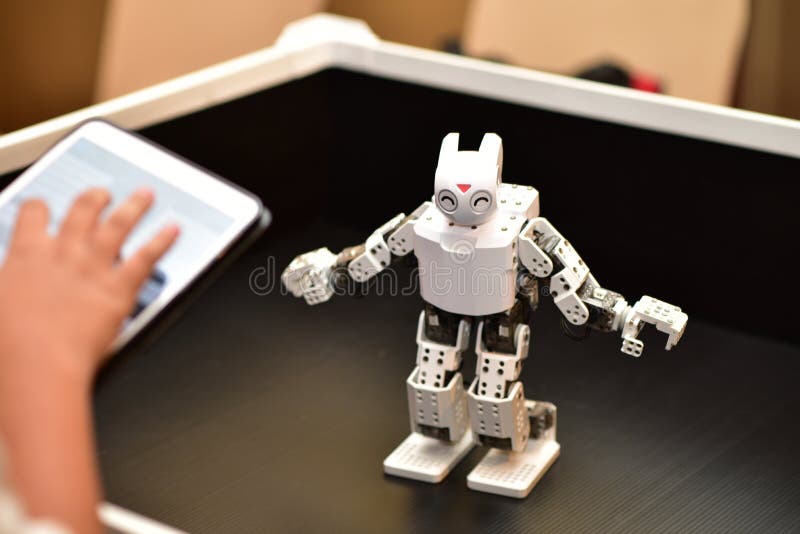 Control a Robot.Move a Robot Stock Image - Image of laptop, engineering ...