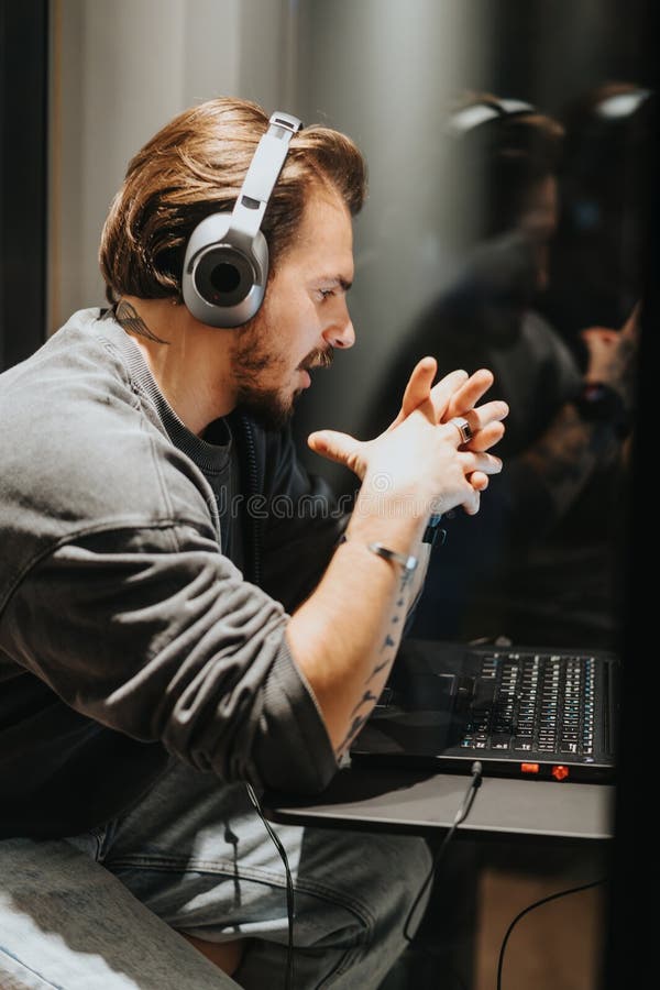 In the Control Room, a Man Orchestrates Operations with Focused ...