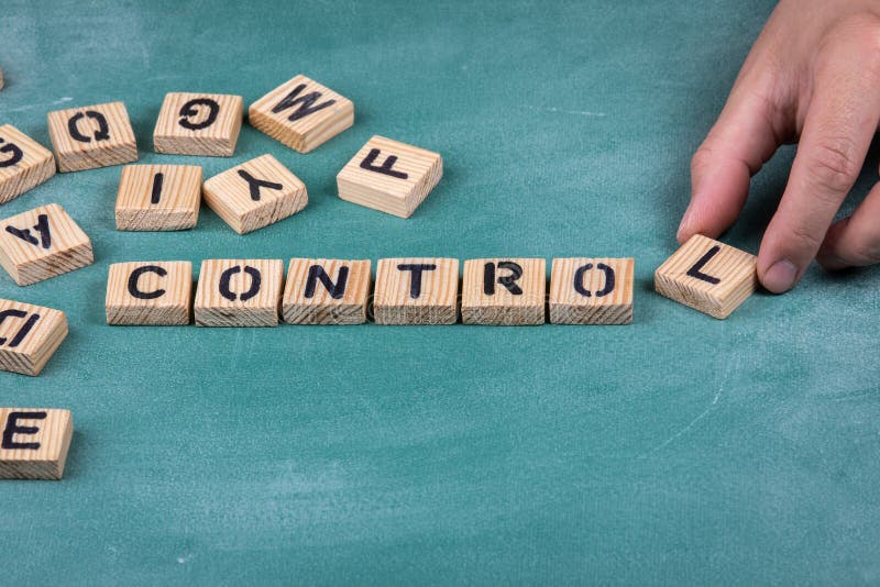 CONTROL. Wooden Alphabet Letters on a Green Blackboard Background Stock ...