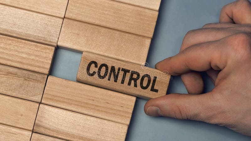 The Word CONTROL on Small Wooden Blocks at the Desk. Top View Stock ...