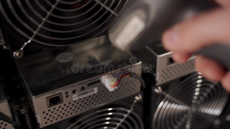 Controller in Uniform Scans ASIC Bitcoin Miners with Barcode Scanner in ...