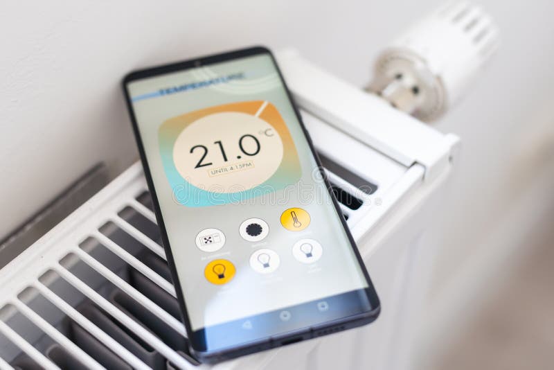 Controlling Radiator Heating Temperature with a Smart Phone, Close-up ...