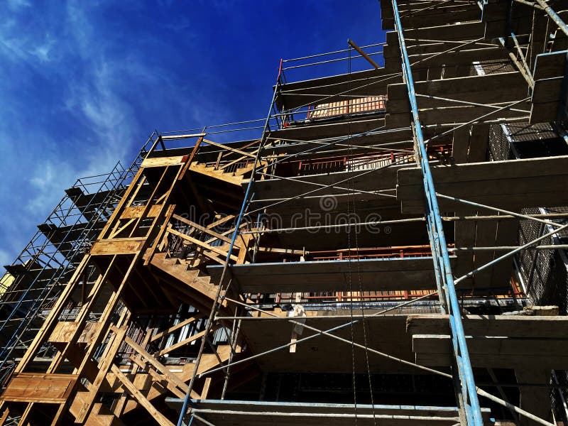 A Contruction Site Under a Blue Sky Stock Image - Image of structures ...
