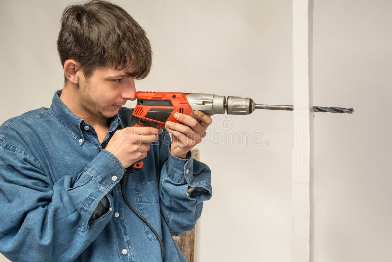 Contruction Worker Making a Hole Stock Photo - Image of young, adult ...