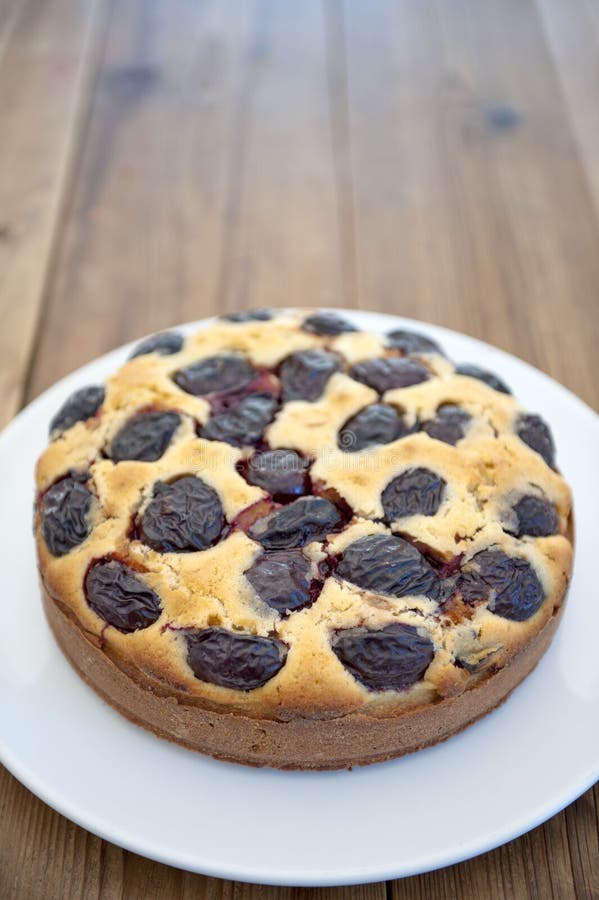 Contry plum cake stock image. Image of goods, plate, closeup - 17405721