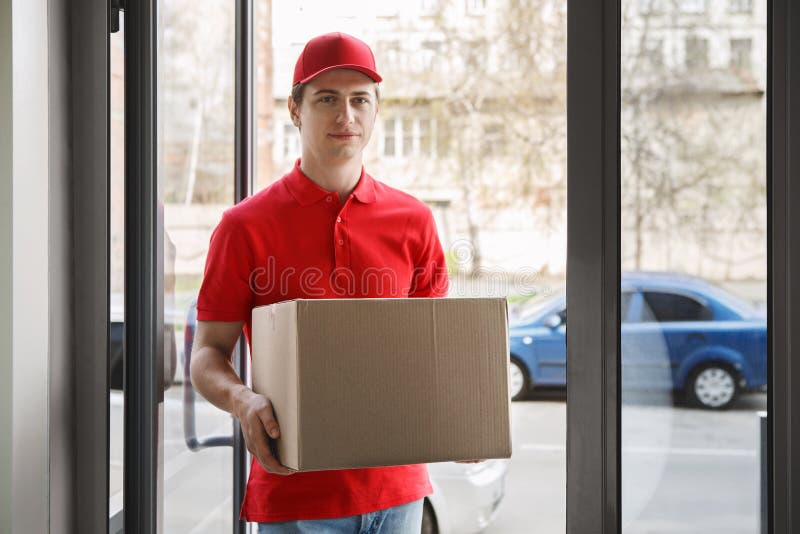 Convenient Home Delivery. Courier Come at House and Holding Box Stock ...