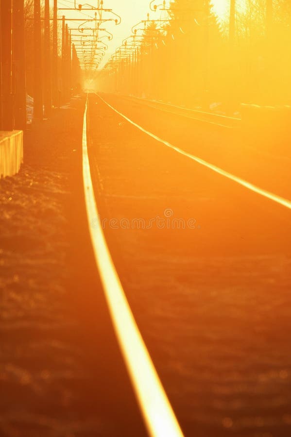 Railroad Tracks Lit by Orange Light of Setting Sun Stock Image - Image ...