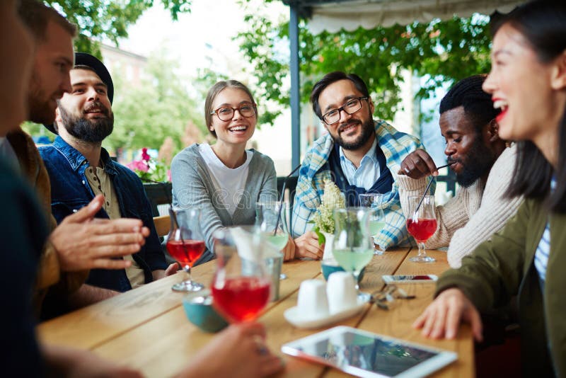 Conversation of friends stock image. Image of intercultural - 75880515