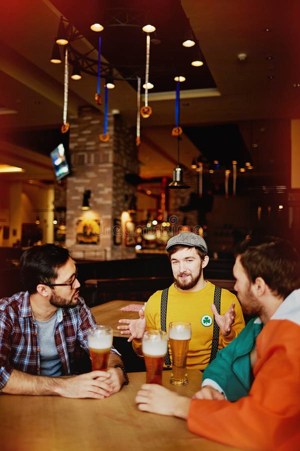 Conversation of guys stock photo. Image of young, tavern - 66452908