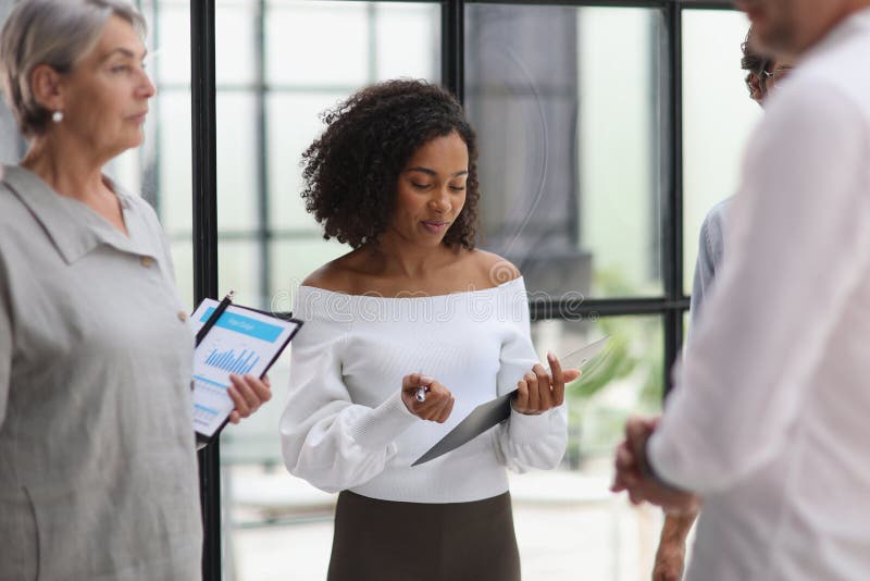 Conversation between Managers and Employees in the Office Stock Photo ...