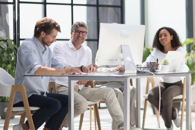 Discussion of Business People in the Office Sitting Stock Image - Image ...