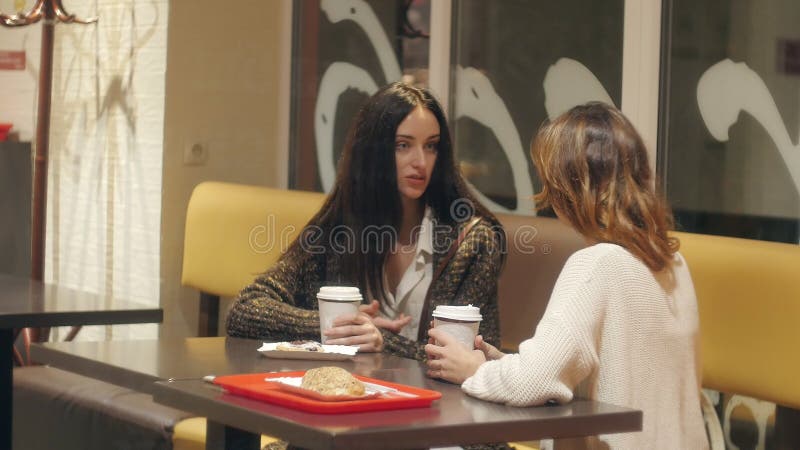 Conversation between Two Girls Stock Video - Video of female, cafe ...