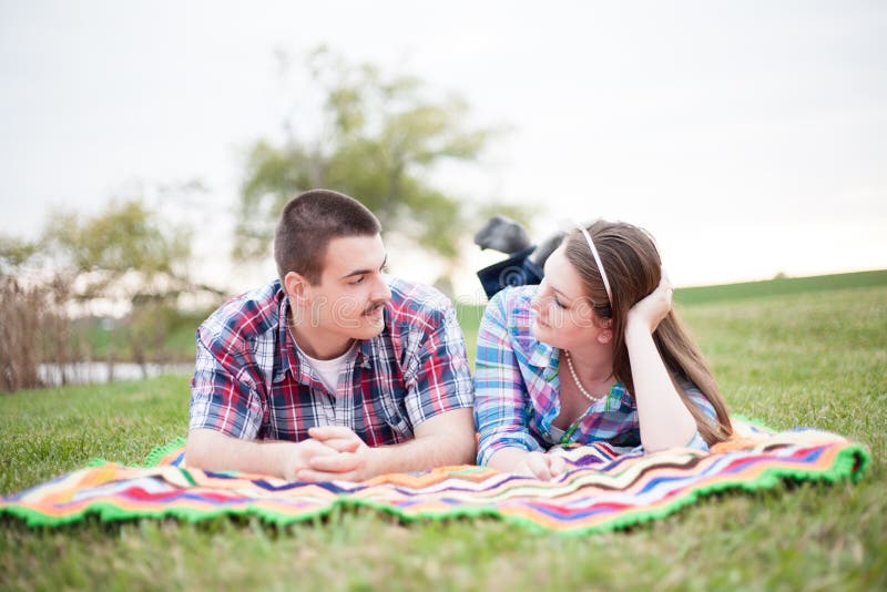 Conversing on the Blanket stock image. Image of engaged - 27310503