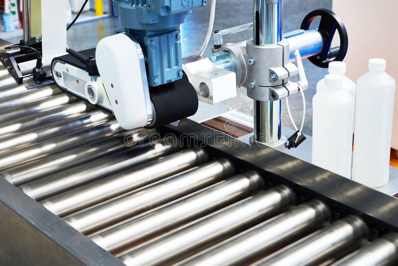 Conveyor labeling machine stock photo. Image of packaging - 258315912