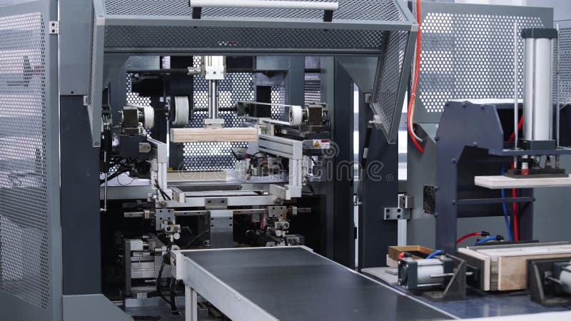 Modern Automatic Machine Line of Cardboard Box. Conveyor Line for the ...