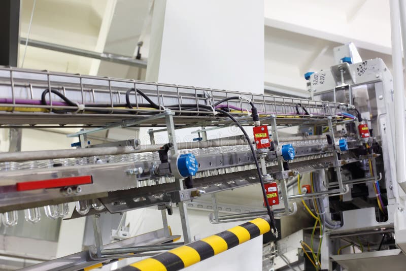 Conveyor with Preforms for Production of Bottles Stock Image - Image of ...