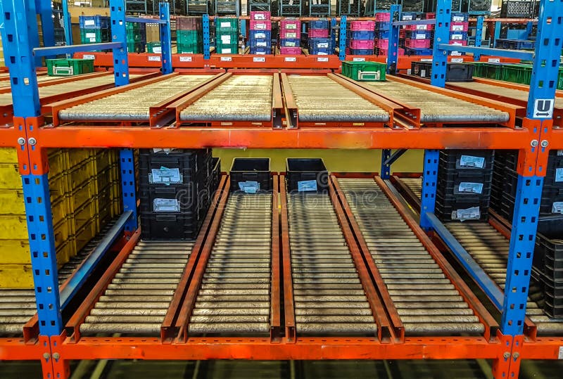 Conveyor Rollers in Distribution Warehouse Stock Image - Image of goods ...