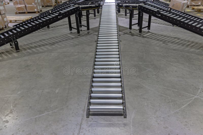 Conveyor Rollers Gravity Slope Stock Photo - Image of metal, industrial ...