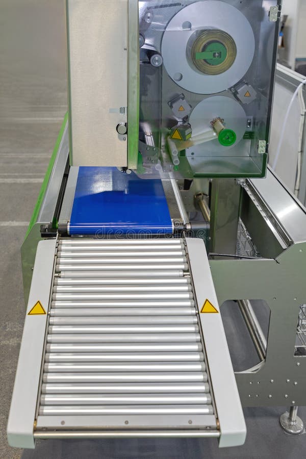 Labeler Machine stock photo. Image of sticky, commercial - 221496106