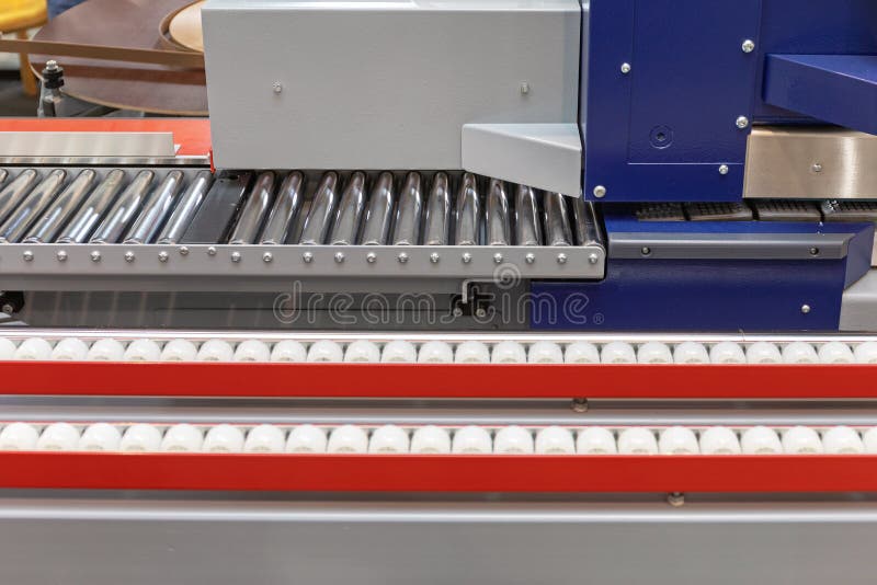Conveyor Rollers Machine stock photo. Image of finish - 138644838