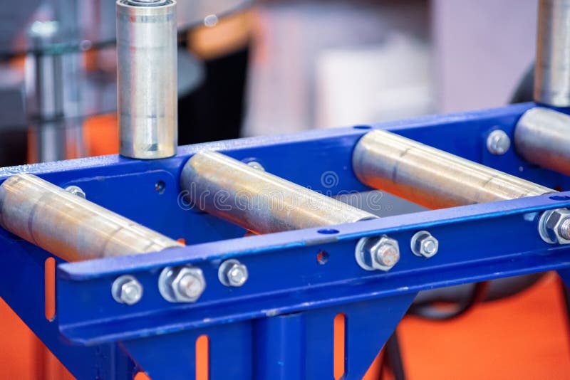 Conveyor Rollers. Metal Rollers on a Conveyor Stock Image - Image of ...