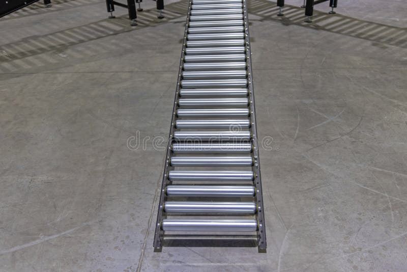 Conveyor Rollers Slope stock image. Image of shipping - 239973089