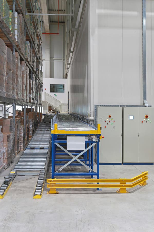 Conveyor in warehouse stock image. Image of interior - 33230017