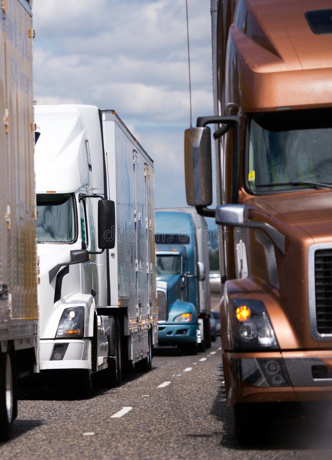 Convoy Semi Trucks Dry Van Trailers on Winding Highway Interstate I-5 ...
