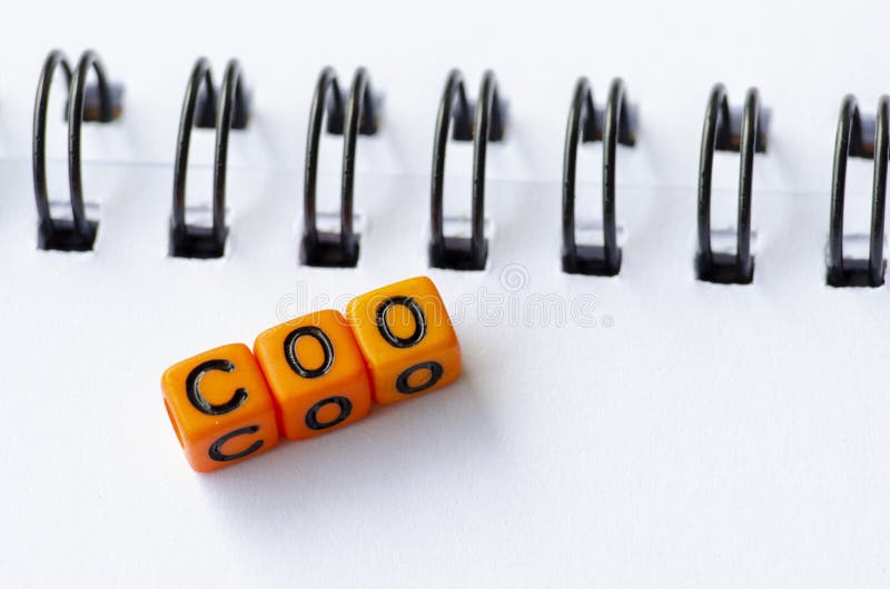 COO Text on Colorful Plastic Alphabet Beads Representing Chief ...