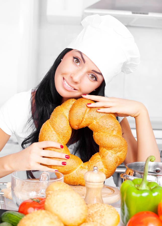 Cook with bread stock image. Image of smile, home, woman - 17551301